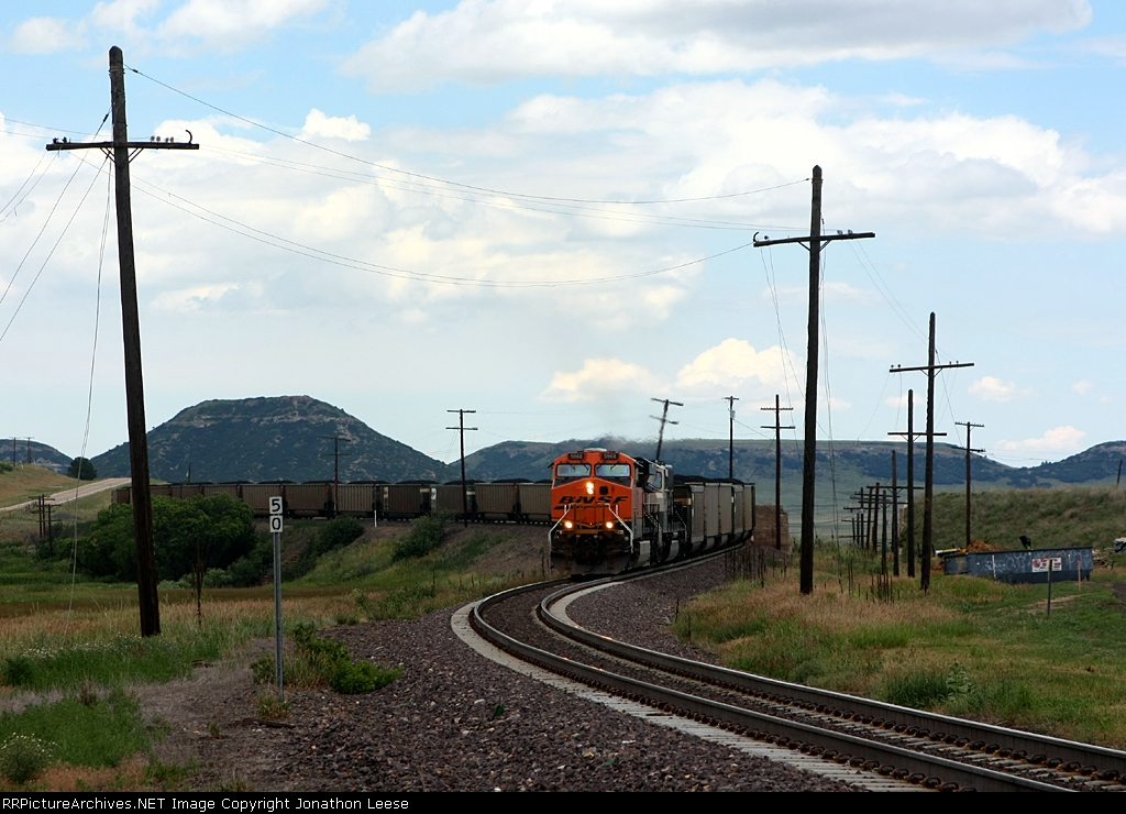 BNSF 5968 snaking its way through an S curve